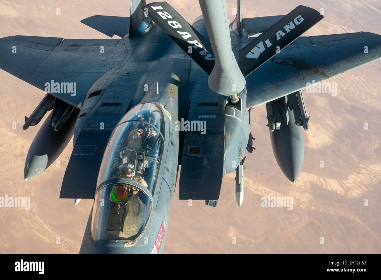 A U.S. Air Force F-15E Strike Eagle receives fuel over the U.S. Central ...