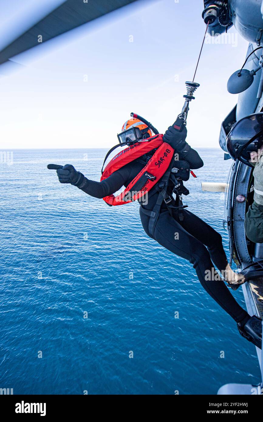 Naval Air Crewman (Helicopter) 2nd Class Matthew Chambers, from Tri ...