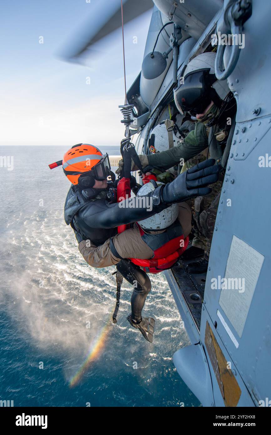 Naval Air Crewman (Helicopter) 3rd Class Jack Williams, right, from ...