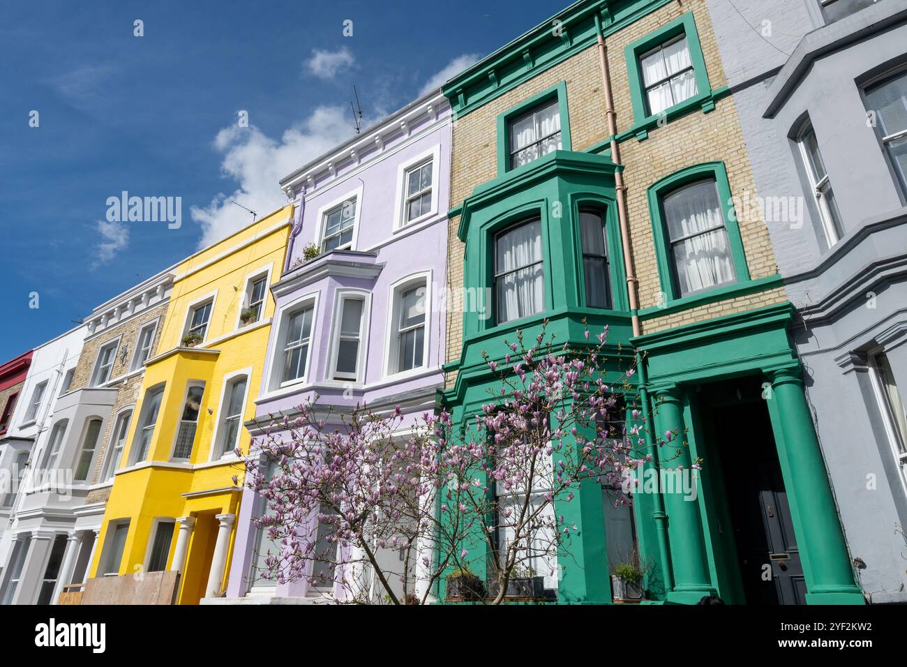 Touristic route on Notting Hill, walking on streets with colourful ...