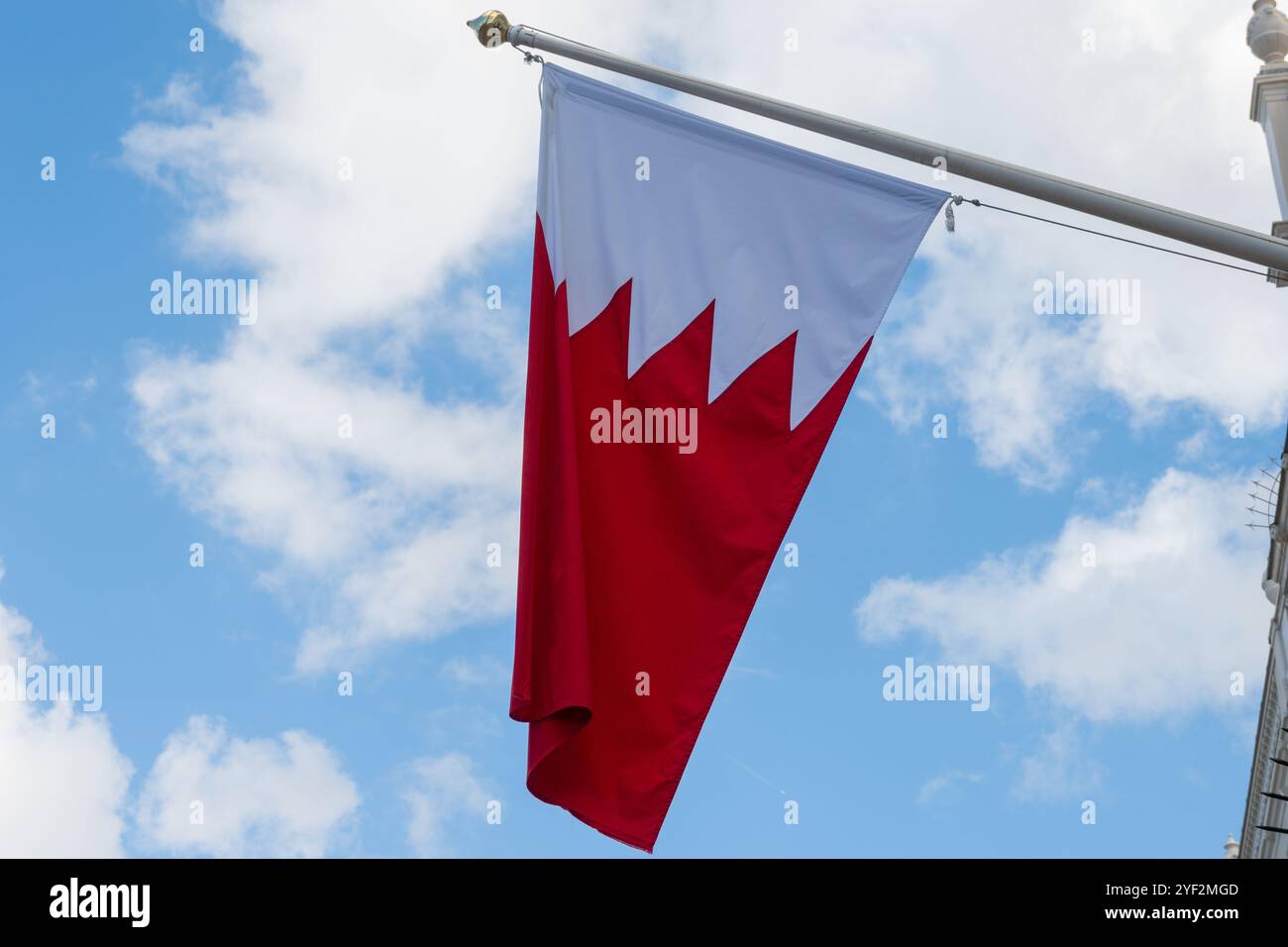 Red white National flag of Bahrain, Kingdom of Bahrain, island country ...