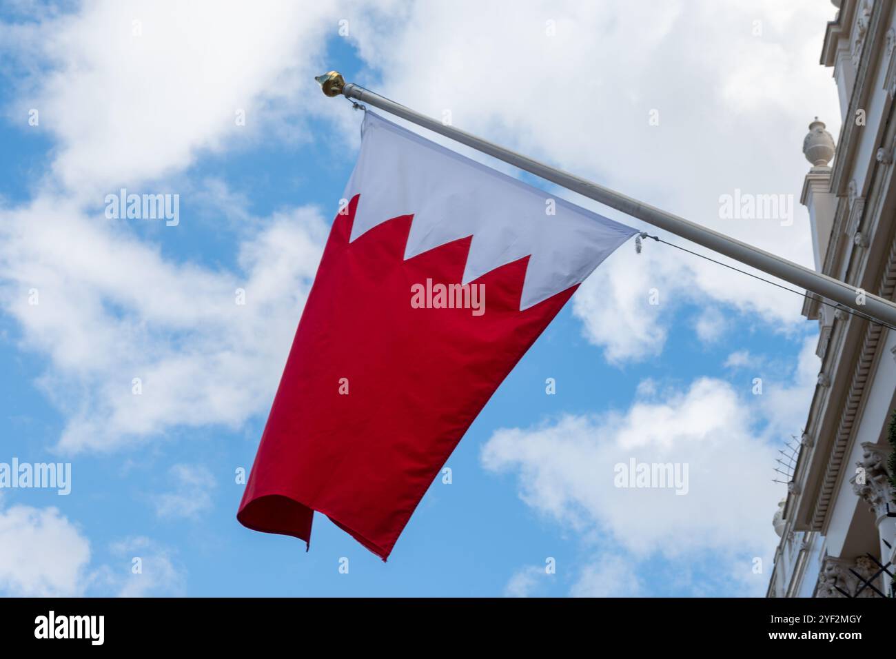 Red white National flag of Bahrain, Kingdom of Bahrain, island country ...
