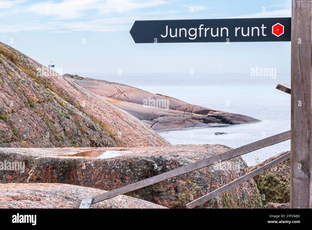 Signpost to the circular route on the Blue Maiden (Bla Jungfrun), an ...