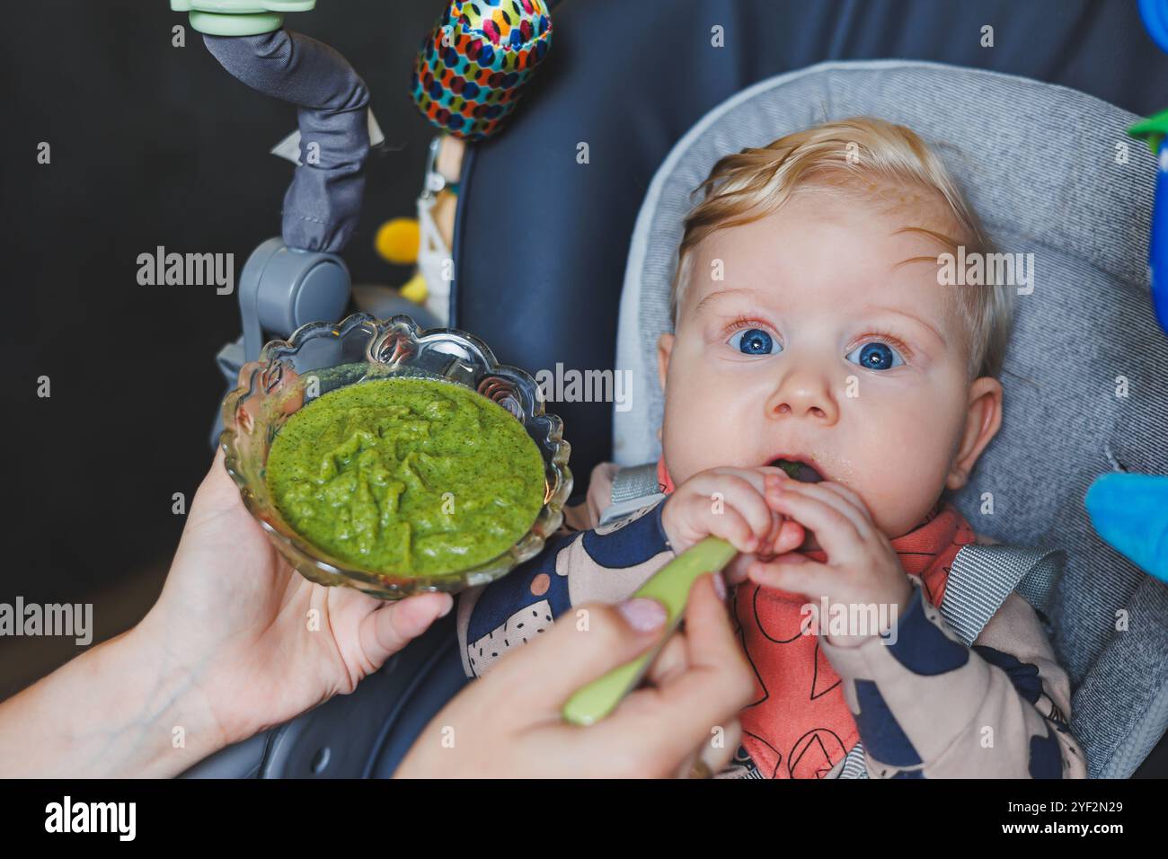 The first complementary food of a child at 6 months. Broccoli puree ...