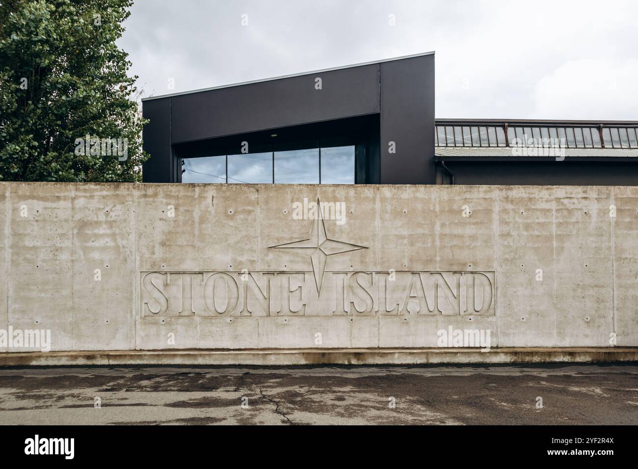 Ravarino, Italy - October 5, 2024: The Stone Island brand logo on the ...