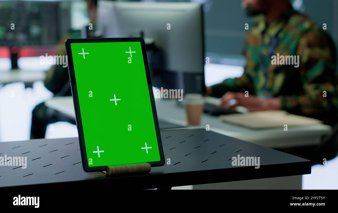 US soldiers working in a top secret operation room with copy space on ...