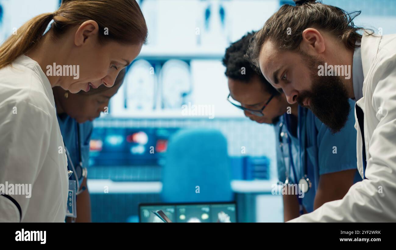 Medic discuss human anatomy scans in a radiology diagnostic meeting at ...