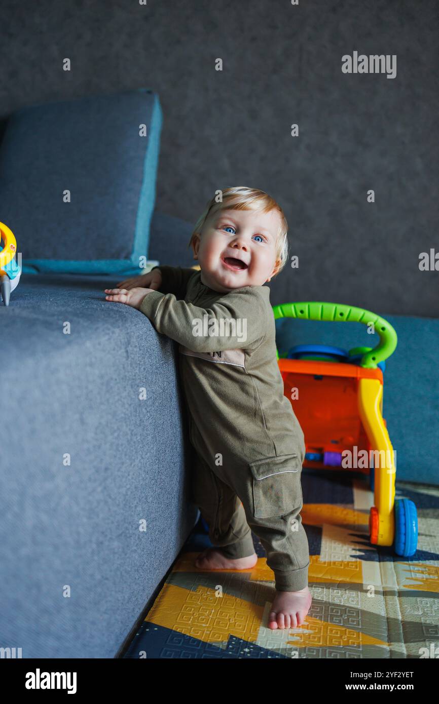baby first steps. happy family kid dream concept. father teaches baby ...