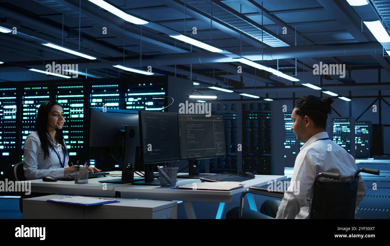 Person with disability in inclusive high tech server room facility ...