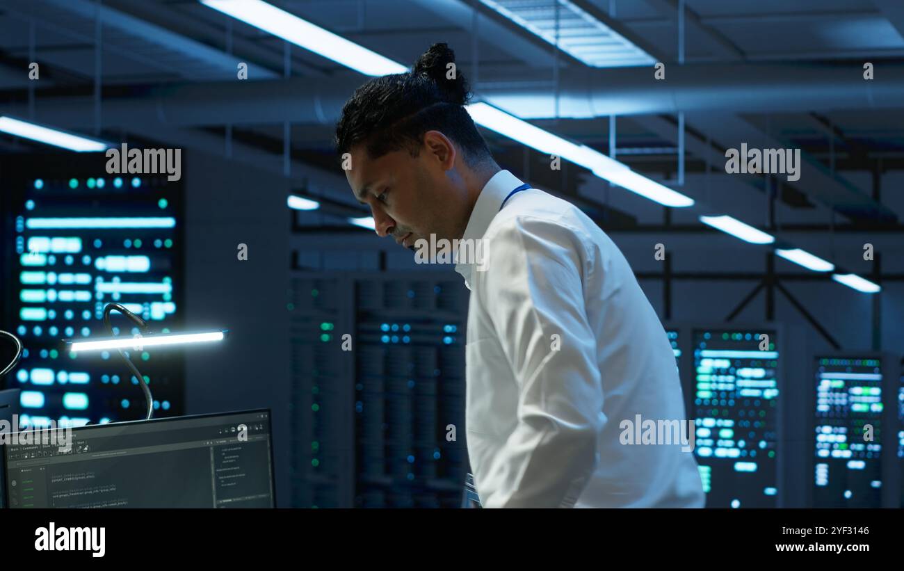 Data center computer scientist responsible for installation of ...