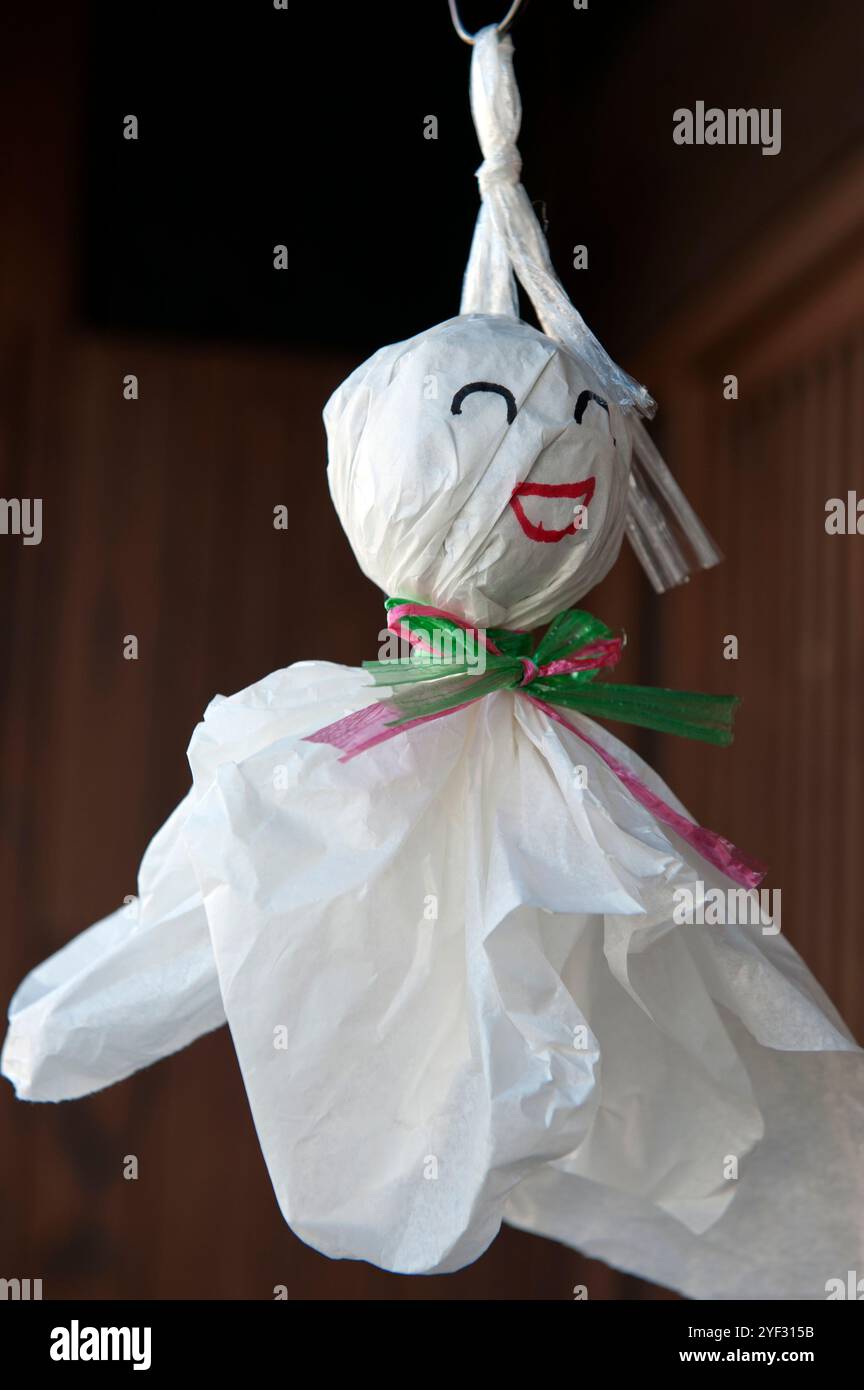 Teru-teru-bozu handmade good luck charm doll hanging outside a Japanese ...