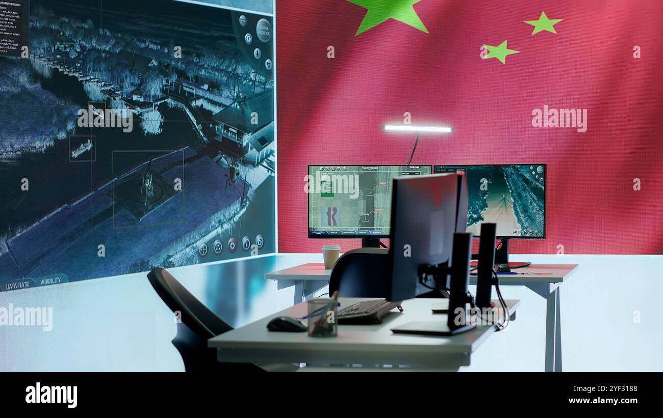 Empty monitoring room equipped with the chinese flag on big screen ...
