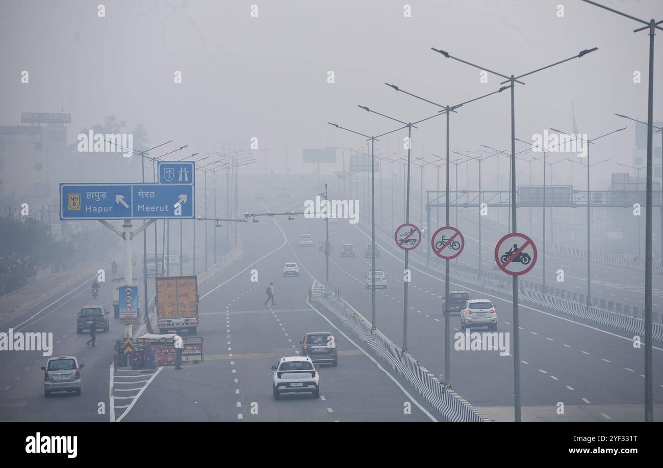 GHAZIABAD, INDIA - NOVEMBER 2: Vehicles move on a Delhi Meerut ...