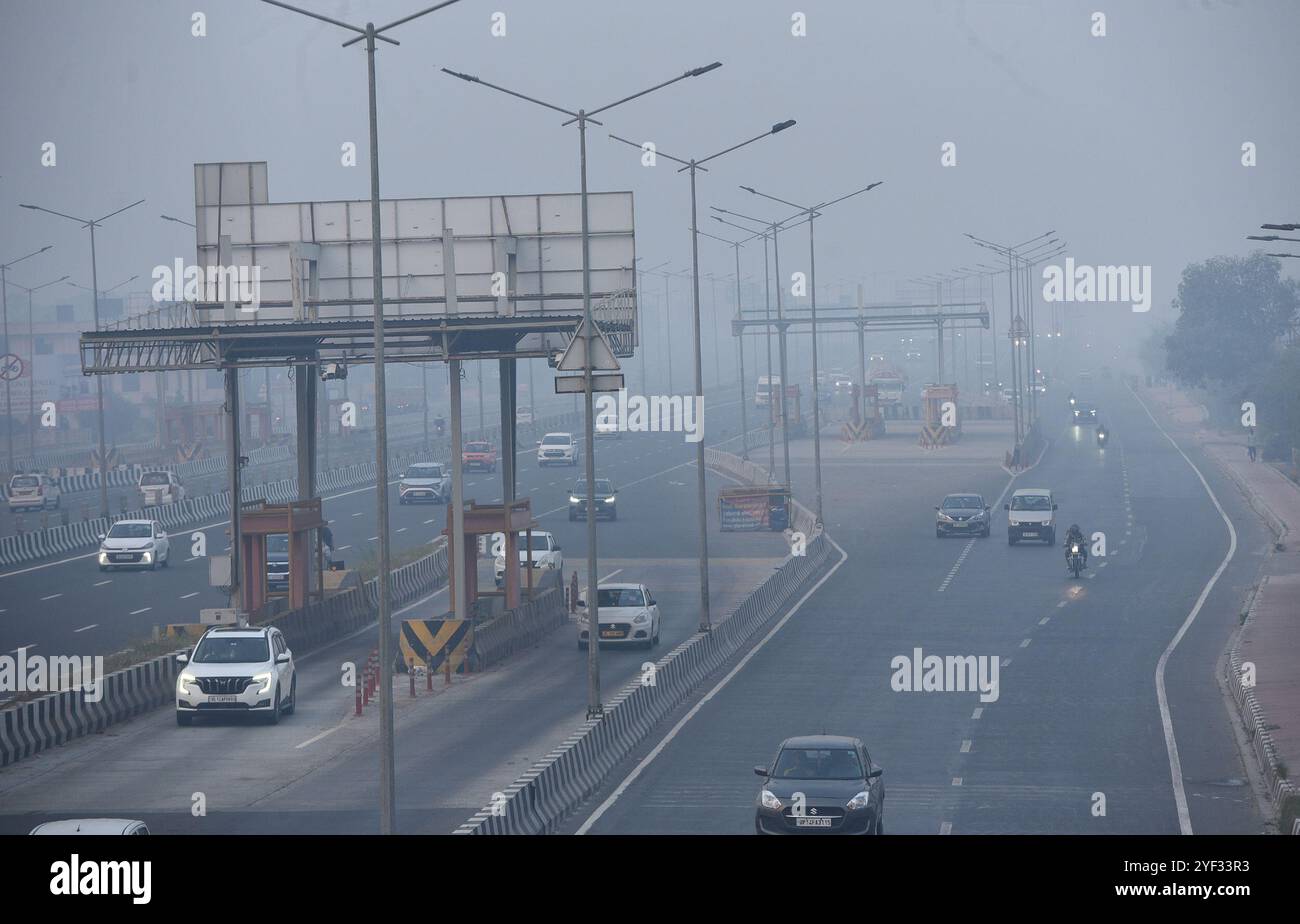 GHAZIABAD, INDIA - NOVEMBER 2: Vehicles move on a Delhi Meerut ...