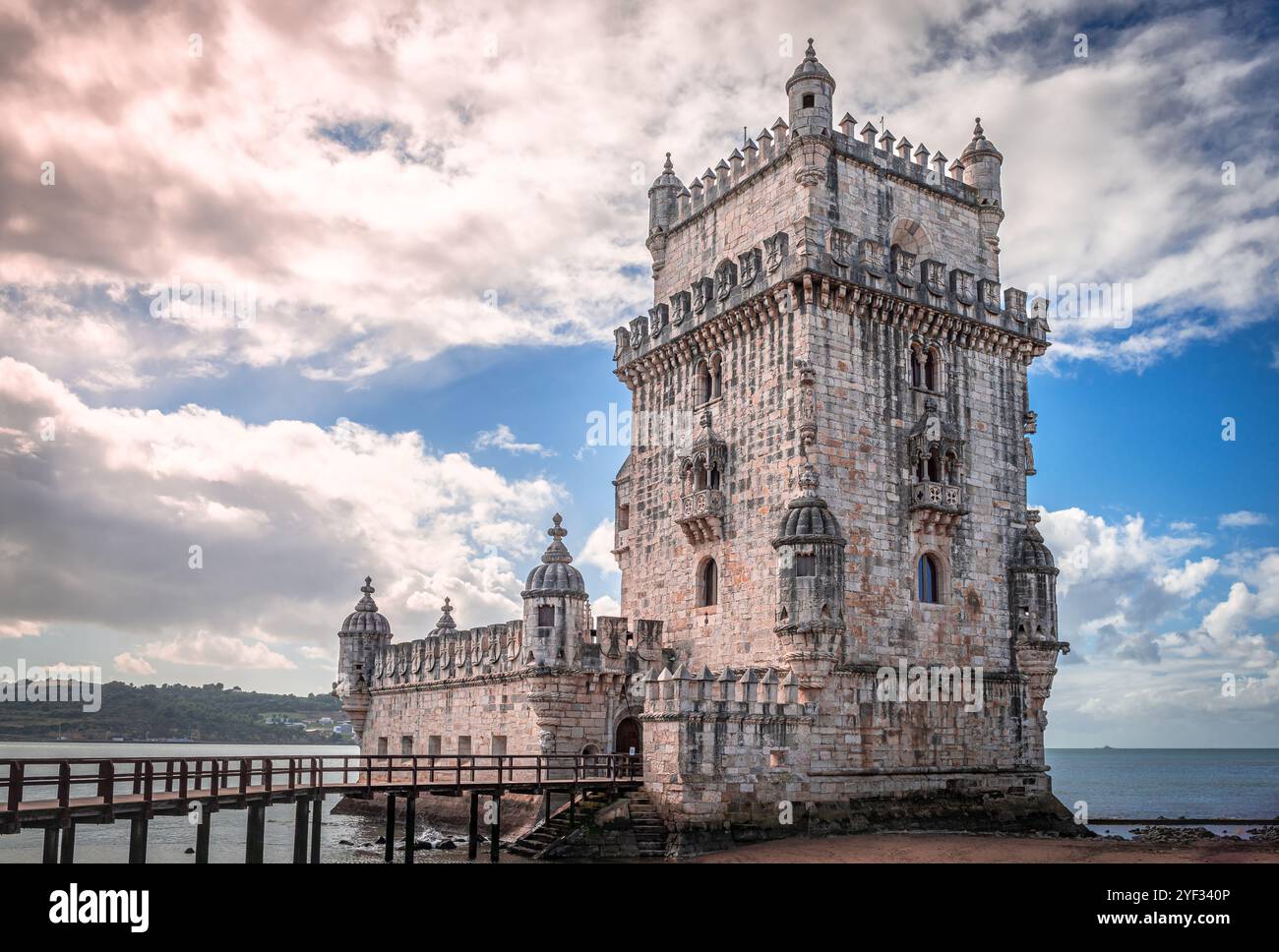 The iconic Belem tower, on the bank of the Tagus river. In Belem ...