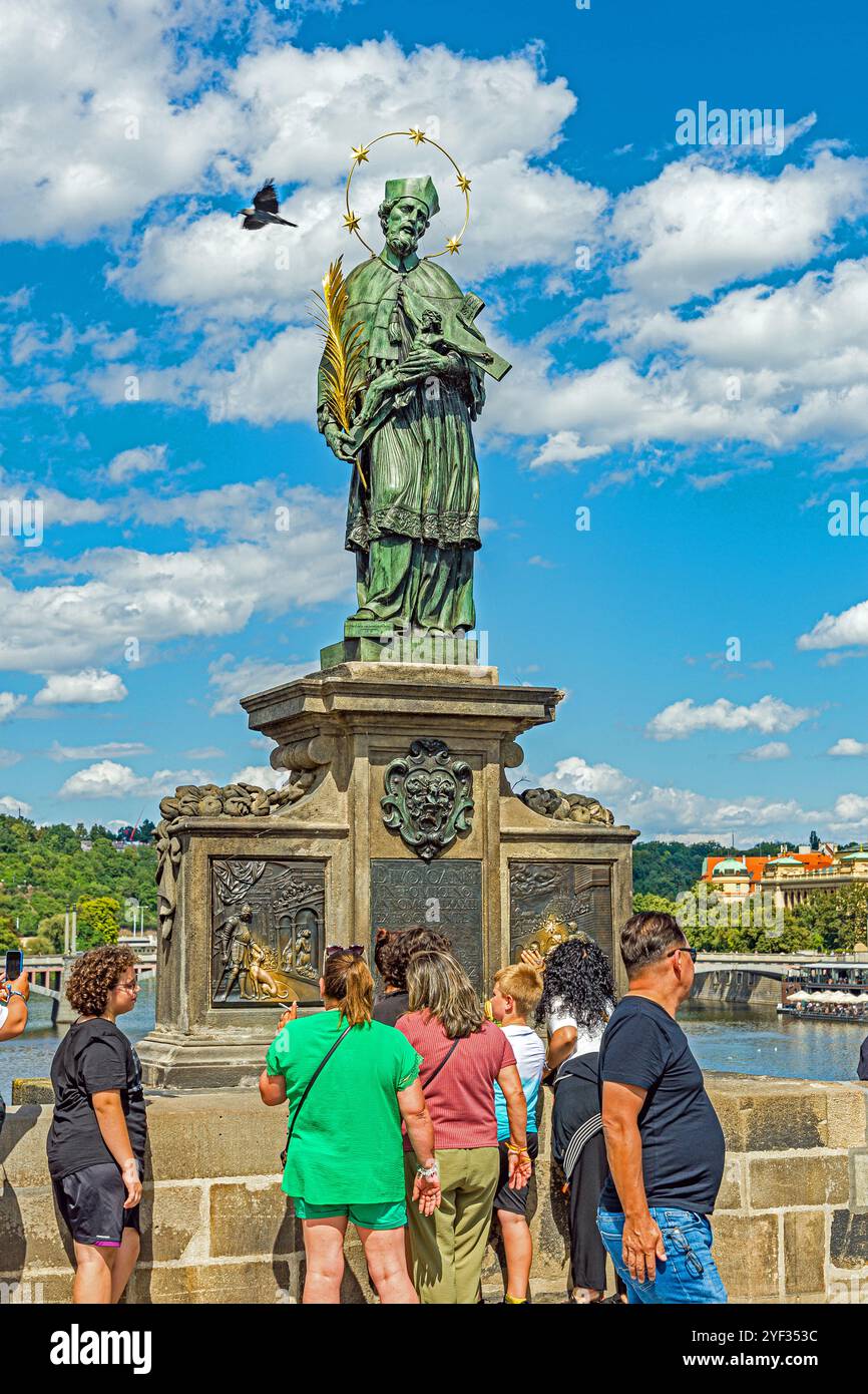 Statue of Saint John of Nepomuk On Charles Bridge in Prague, Czech ...