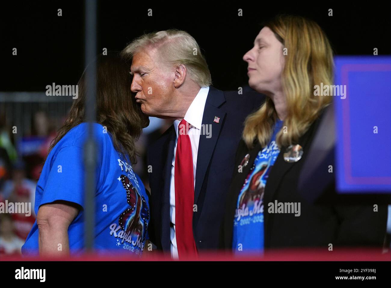 Republican presidential nominee former President Donald Trump kisses a ...