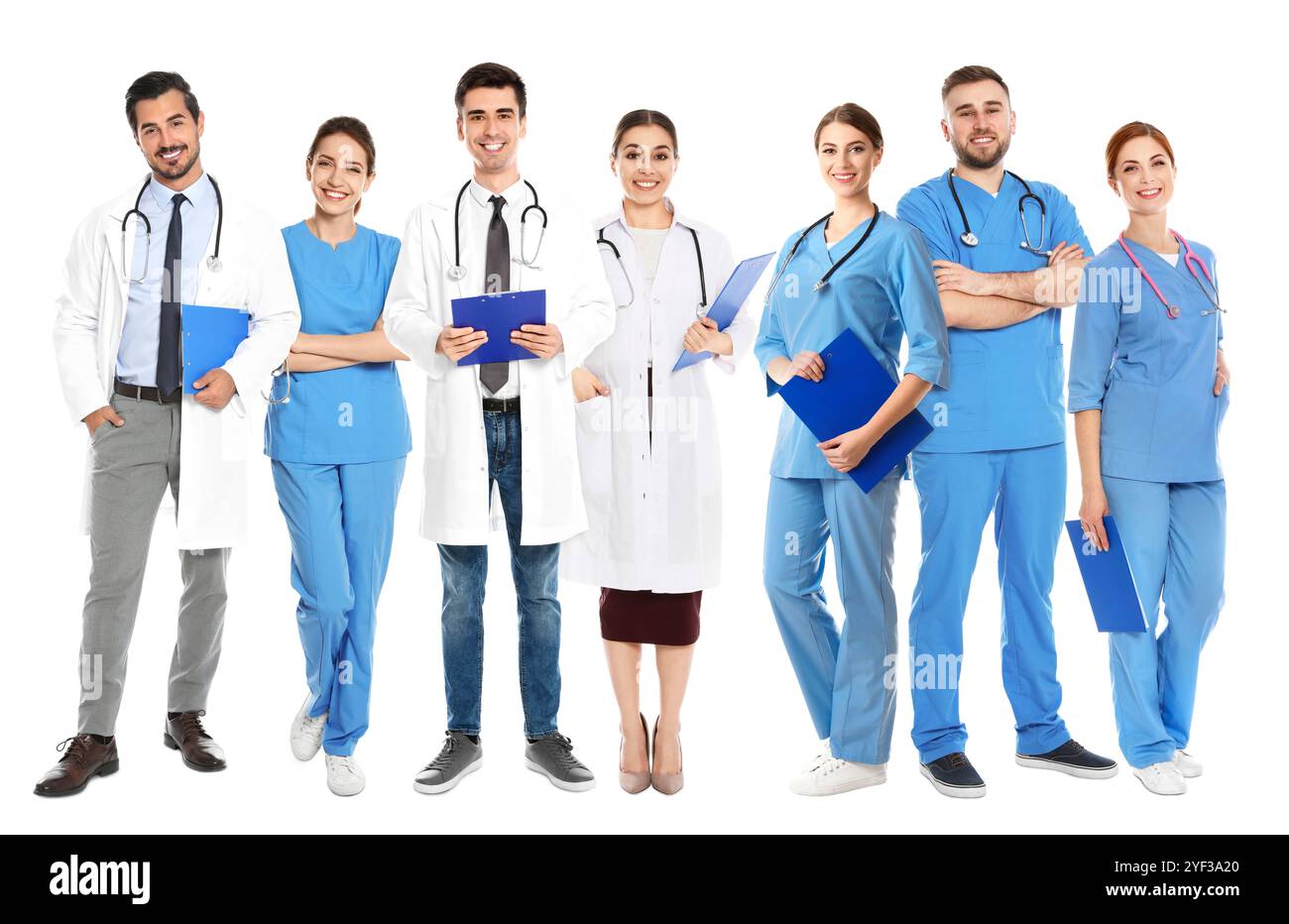 Different healthcare workers in uniforms on white background Stock ...