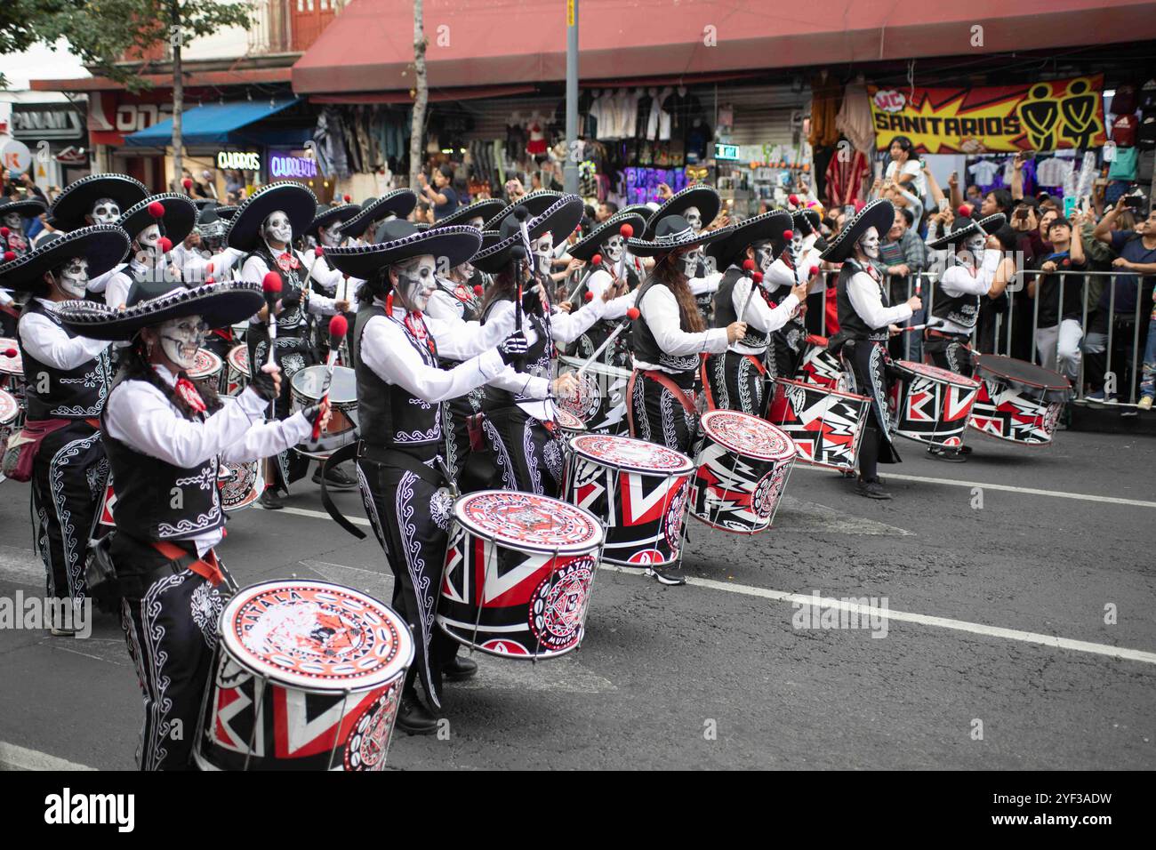 Floats and hundreds of citizens dressed in Day of the Dead-themed ...