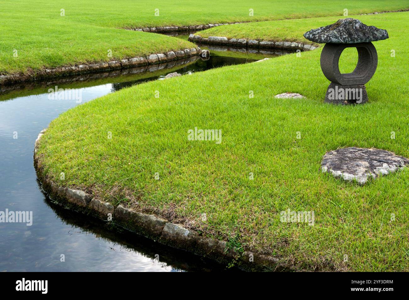 Unique round lantern and zigzag stream at Okayama Korakuen Japanese ...