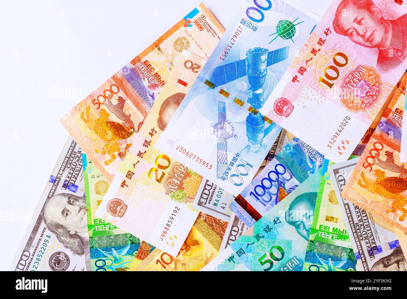 Chinese yuan, US dollars, Kazakhstan tenge banknotes are part of global ...