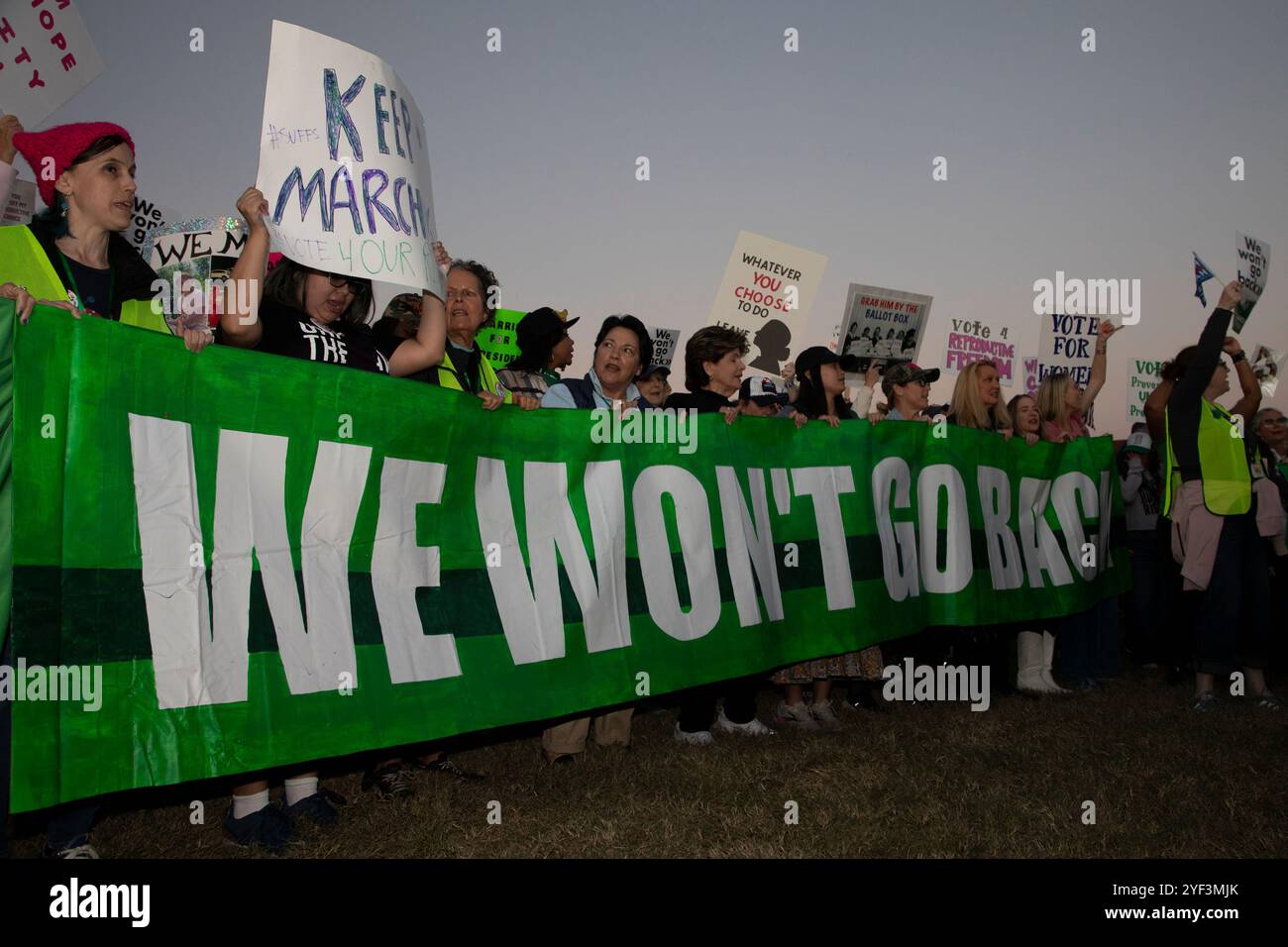 Demonstrators chant slogans during the National Women's March in front ...