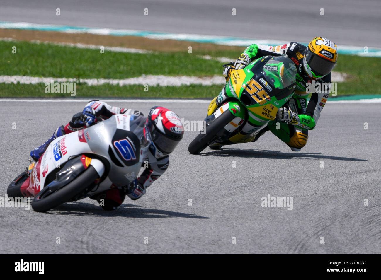 Swiss rider Noah Dettwiler of CIP, right, steers his bike chase after ...