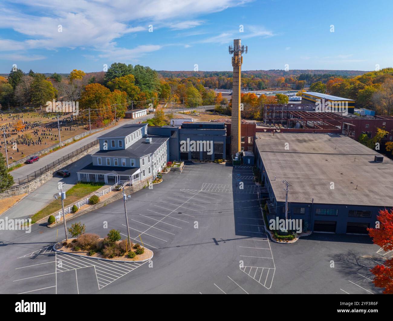 Bernat Mill aerial view in fall with fall foliage at 19 Depot Street in historic town center of ...