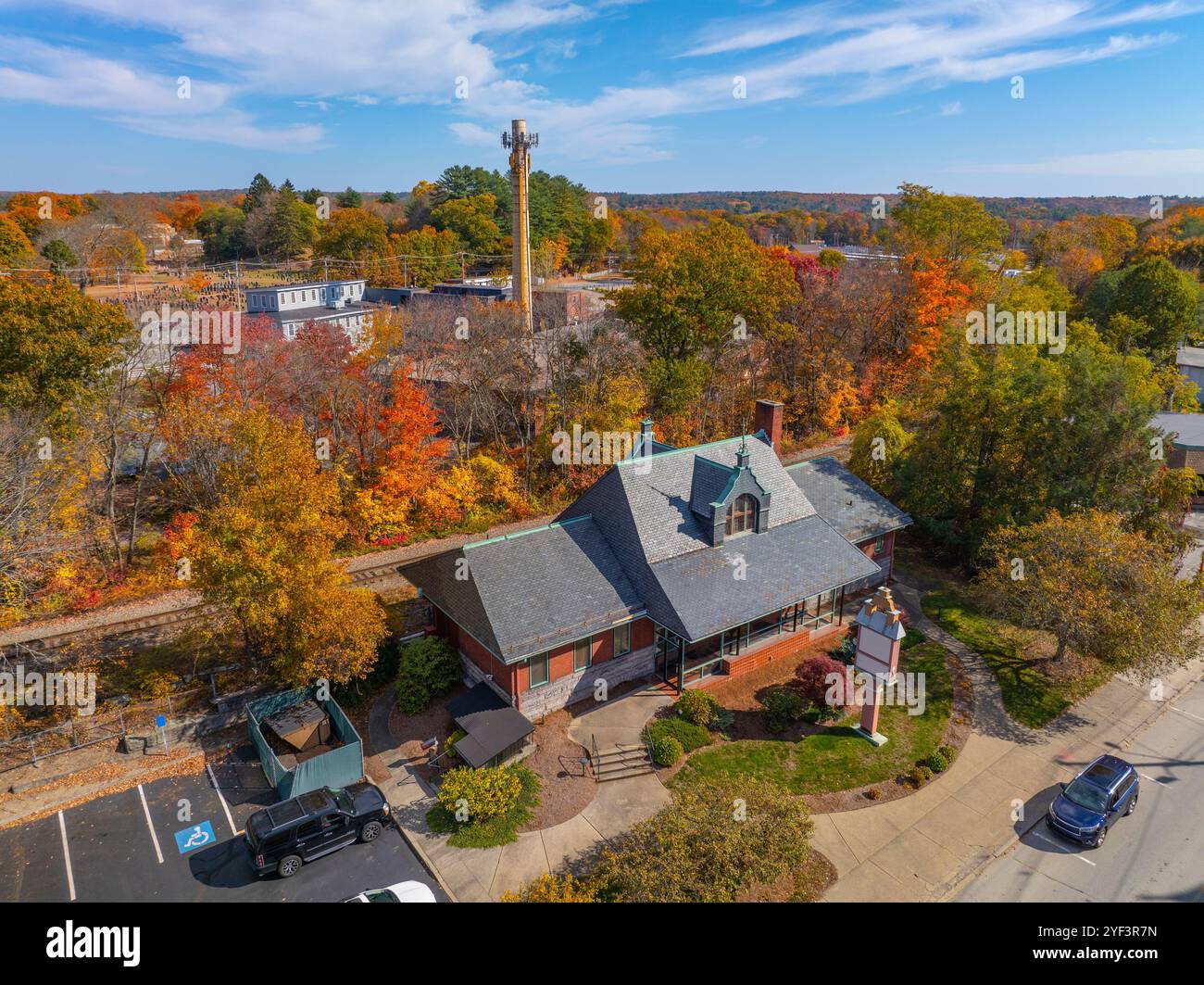 Uxbridge station aerial view in fall with fall foliage at 20 S Main Street in historic town ...