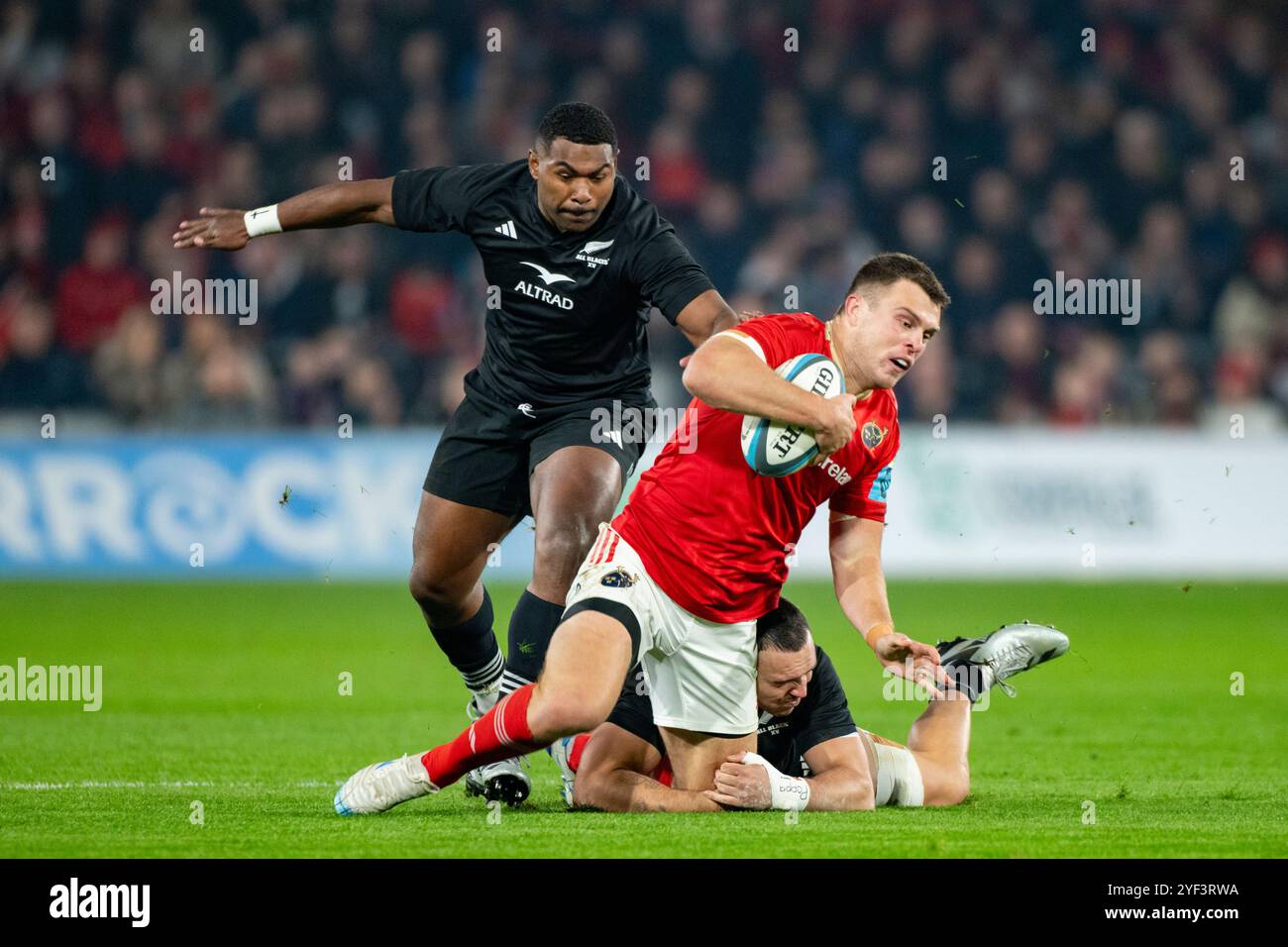 Limerick, Ireland. 03rd Nov, 2024. Tom Farrell of Munster tackled by ...
