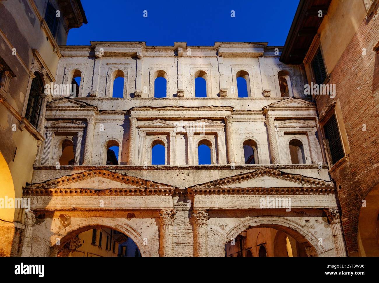 Awesome evening view of the Porta Borsari in Verona, Italy. The ancient ...