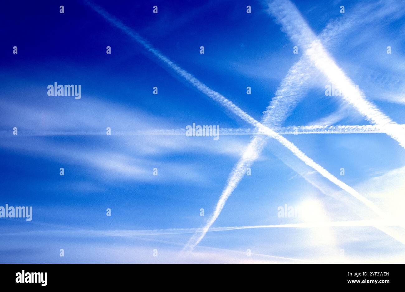 Aircraft vapor trails in Bavarian sky, Germany Stock Photo - Alamy