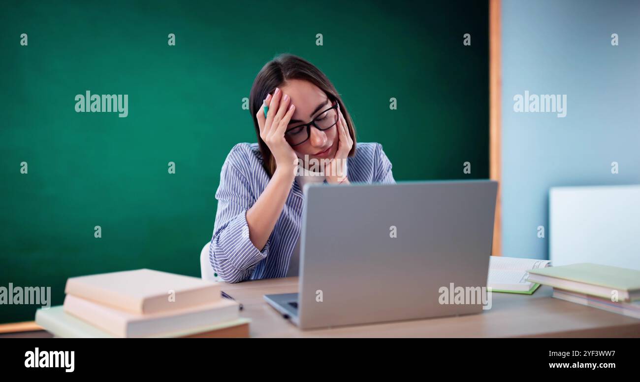 Bored Girl In Classroom Using Computer Technology. Laptop In Education ... Bored Girl In Classroom Using Computer Technology. Laptop In Education ...