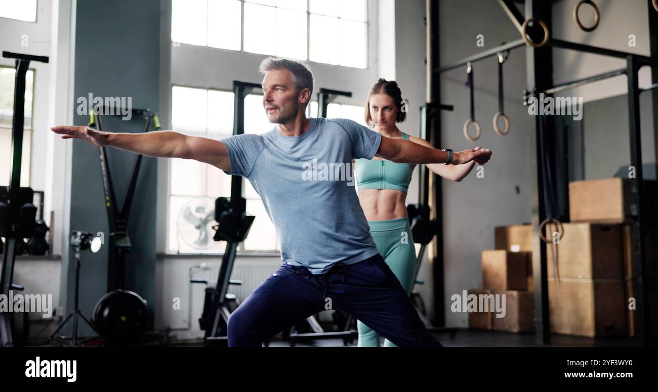 Personal trainer showing training hi-res stock photography and images ...