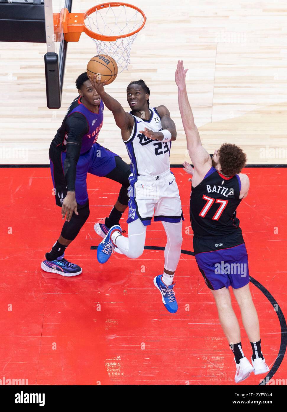 Toronto, Canada. 2nd Nov, 2024. Keon Tyrese Ellis (C) of Sacramento ...
