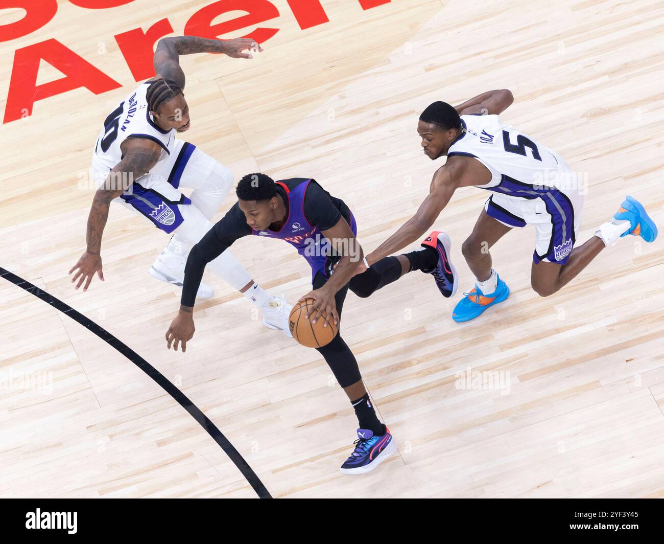 Toronto, Canada. 2nd Nov, 2024. RJ Barrett (C) of Toronto Raptors breaks through during the 2024 ...