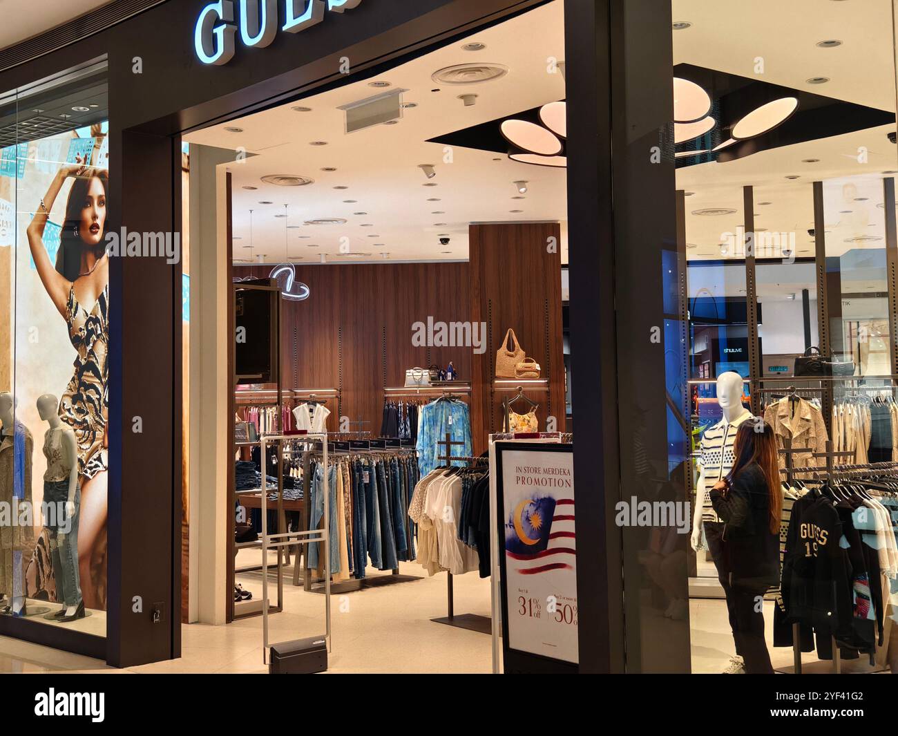 KUALA LUMPUR, MALAYSIA - AUGUST 28, 2024: Guess brand retail shop in ...