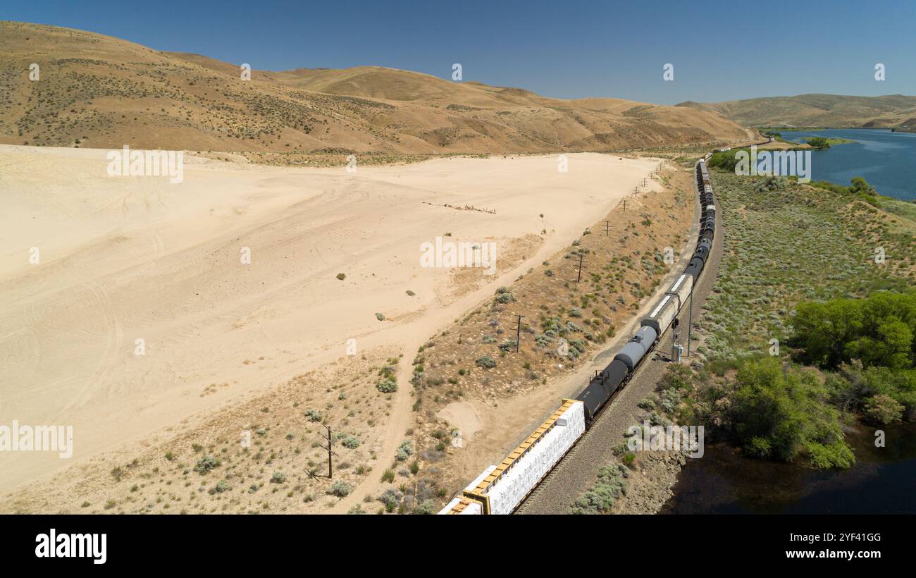 Scenic Train Journey Through Remote Desert Landscape Stock Photo - Alamy