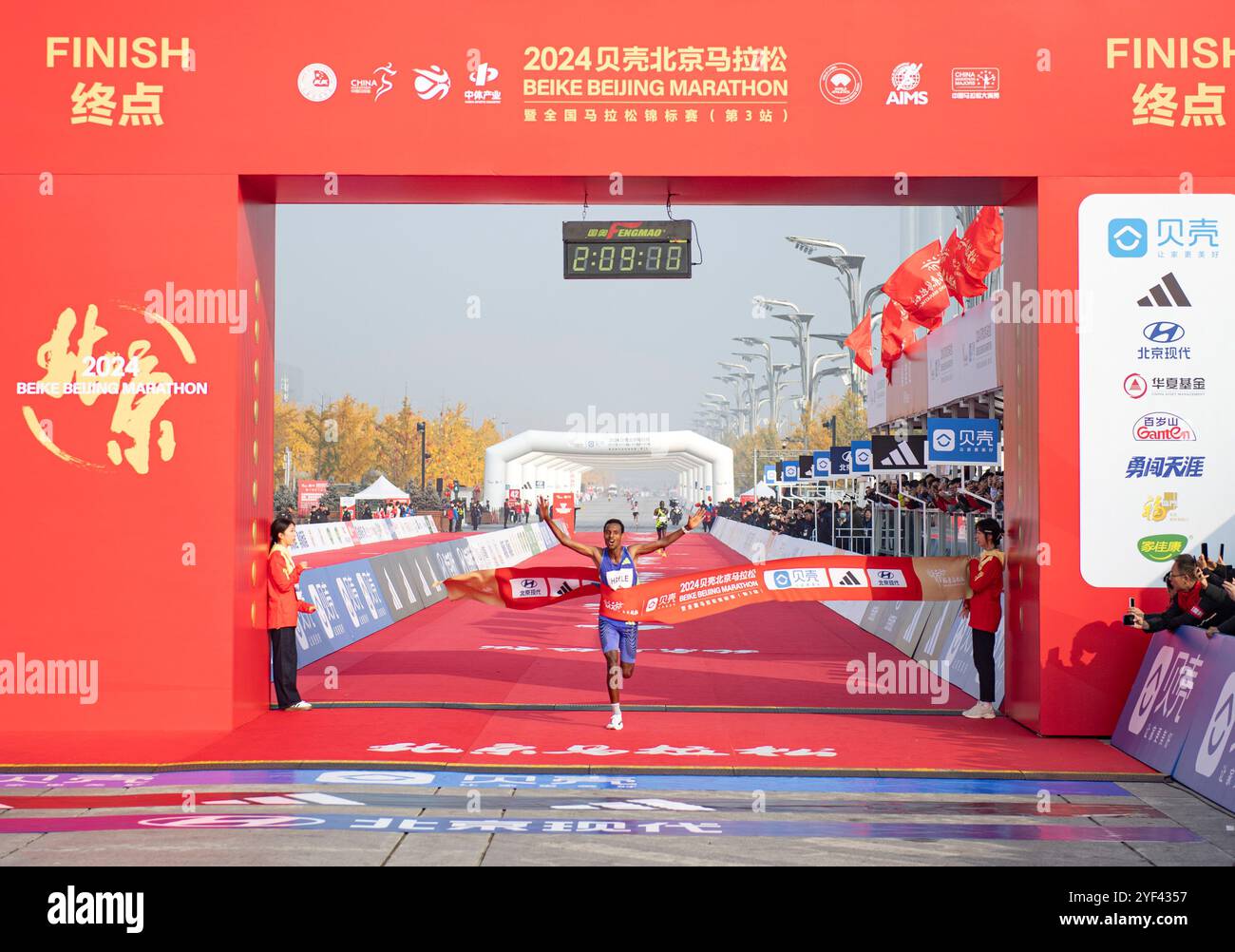 Beijing, China. 3rd Nov, 2024. Lemi Berhanu Hayle of Ethiopia crosses the finish line during the ...