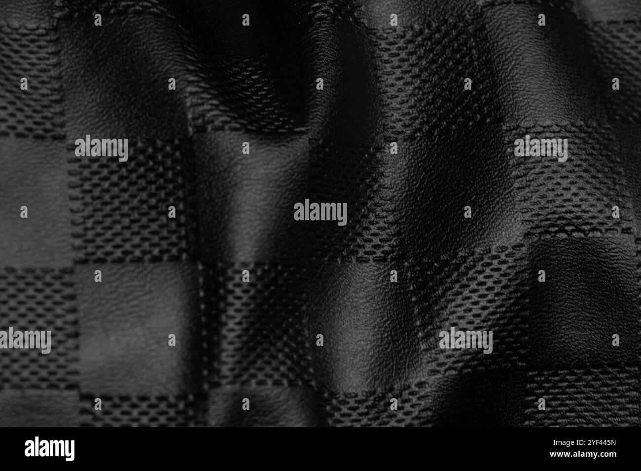 Black faux leather textured hi-res stock photography and images - Alamy
