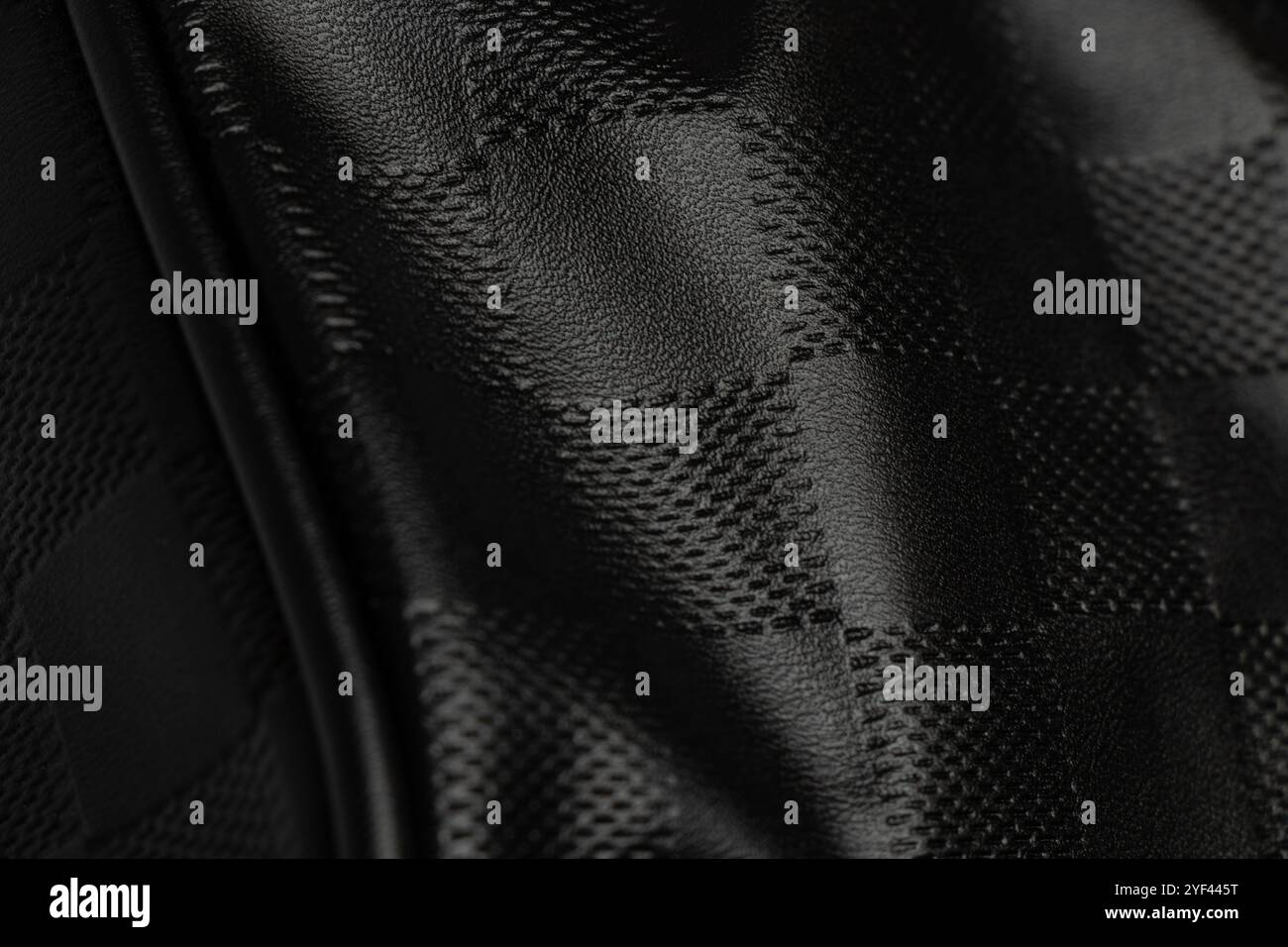 Black checkered faux leather with creases as background, black leather ...