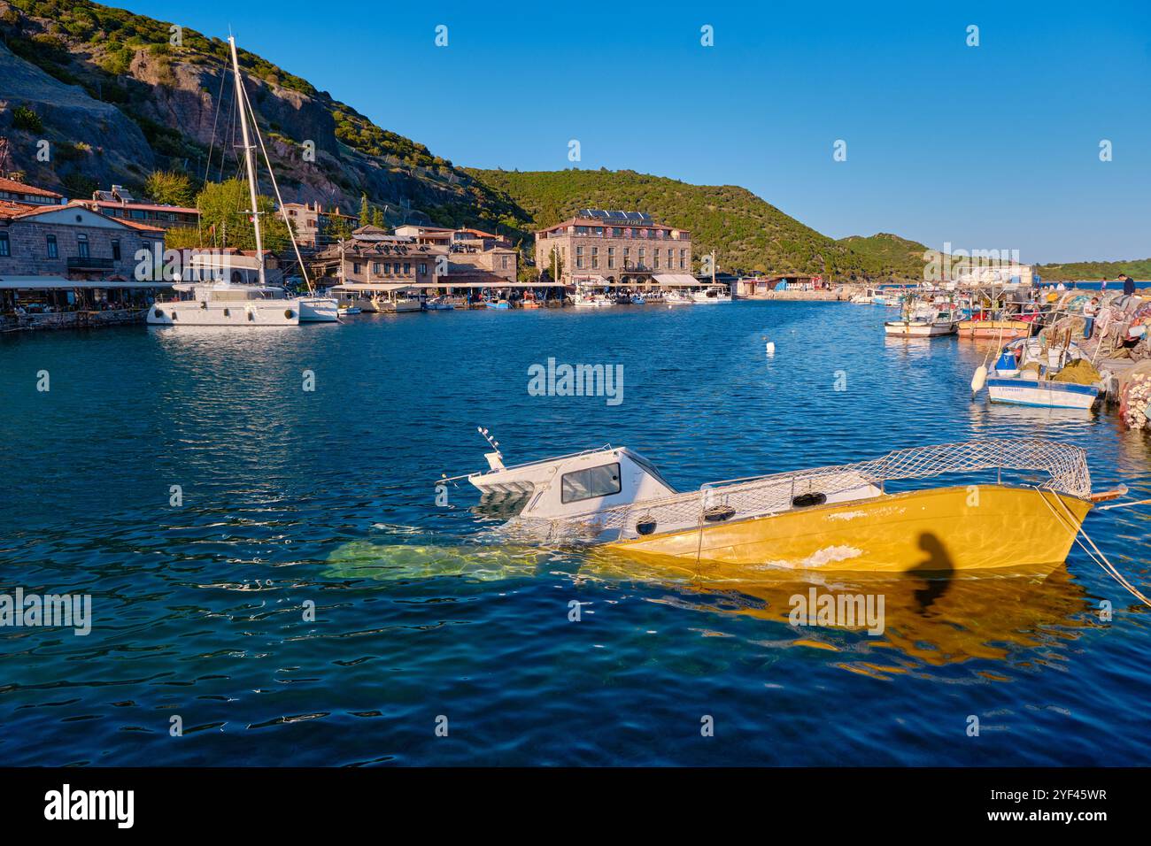 Asos, Turkey: 04.15.2024: Touristy city Asos and sinking yellow boat ...