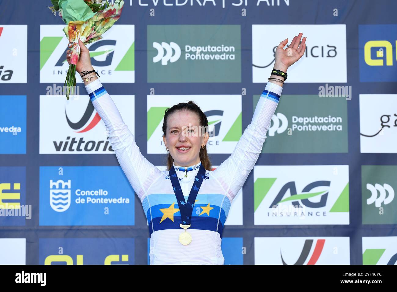 Swiss Anja Grossmann celebrates on the podium after winning the Junior ...