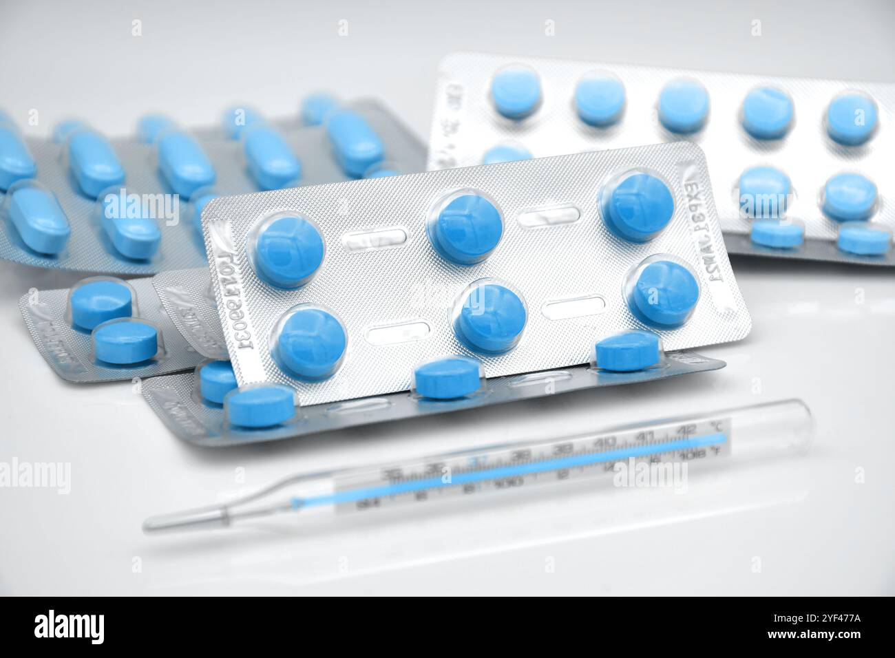 Oral thermometer and various kind of medicine for fever presented on ...
