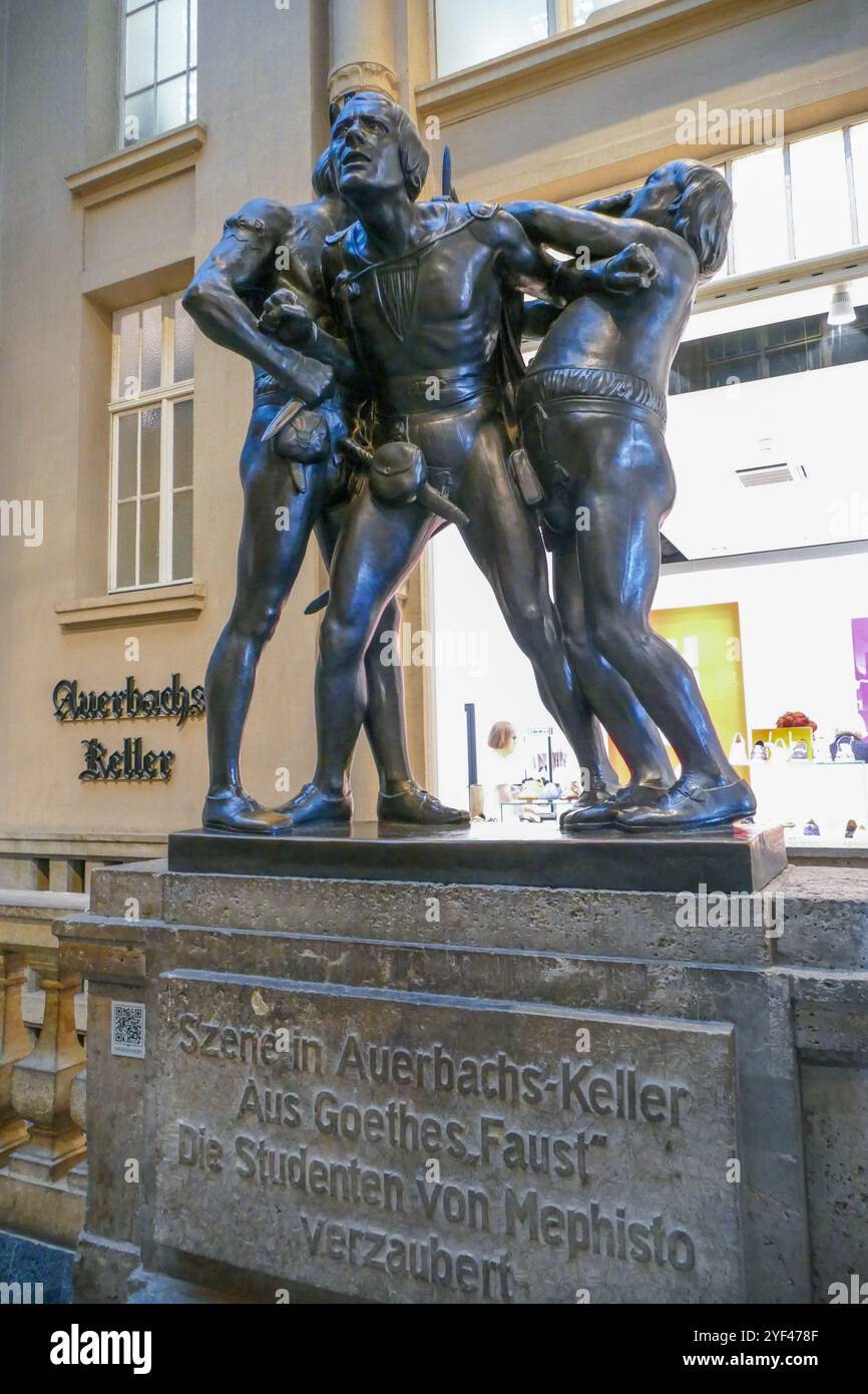Leipzig, Germany - Sep 10, 2024: statue of Mephisto with students in ...