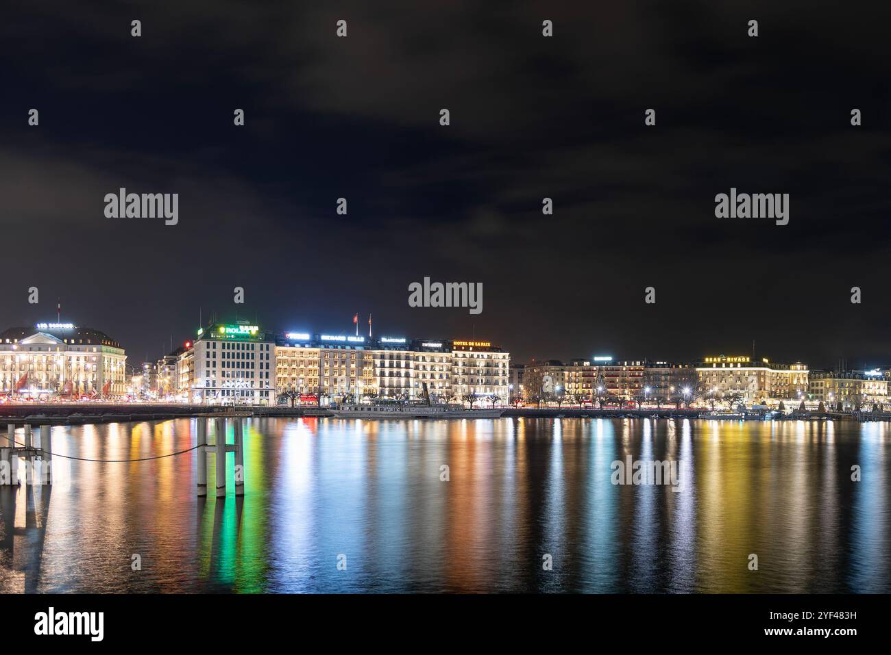 Geneva, Switzerland - View of the Quai du Mont-Blanc by night in Geneva ...