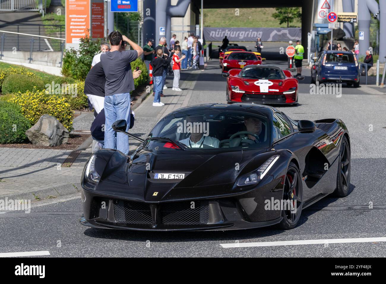 Nürburg, Germany - View on a black Ferrari LaFerrari driving on a ...
