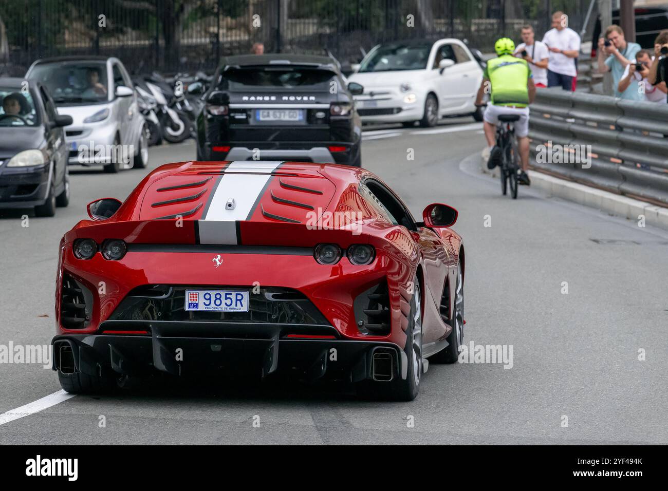 Monte Carlo, Monaco - View on a red Ferrari 812 Competizione driving on ...