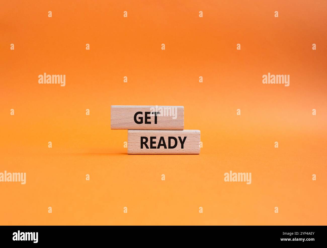 Get ready symbol. Wooden blocks with words Get ready. Beautiful orange ...