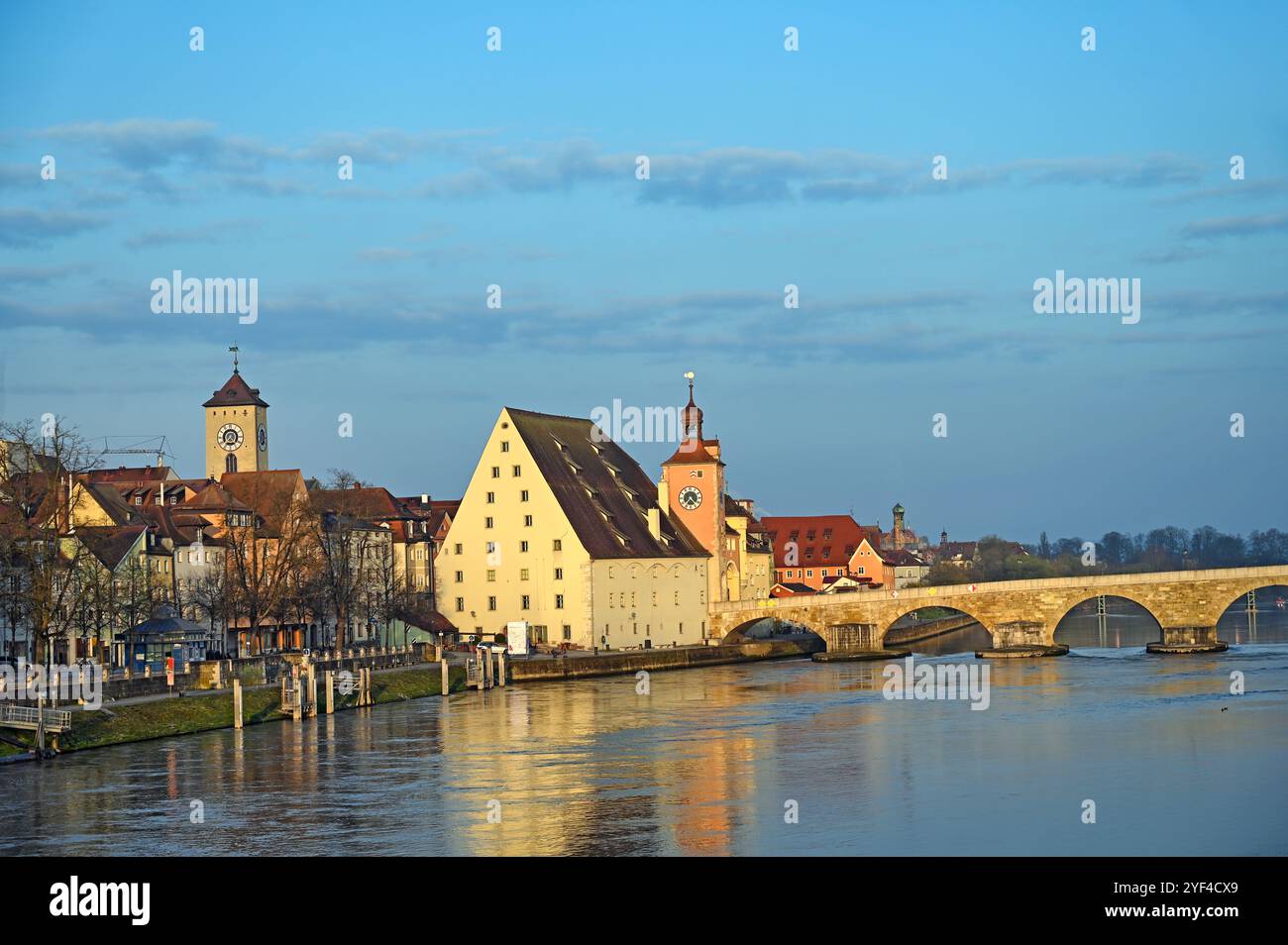 Old stone bridge and clock towers in Regensburg Germany Stock Photo - Alamy